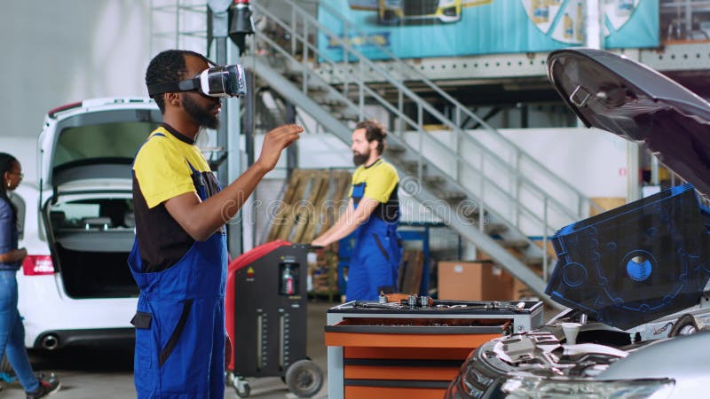 Worker Fixes Car Helped by VR Technology Stock Video - Video of engine ...