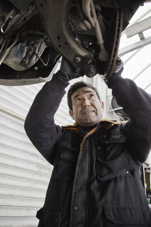 Fat Car Mechanic Stock Photos - Free & Royalty-Free Stock Photos from ...