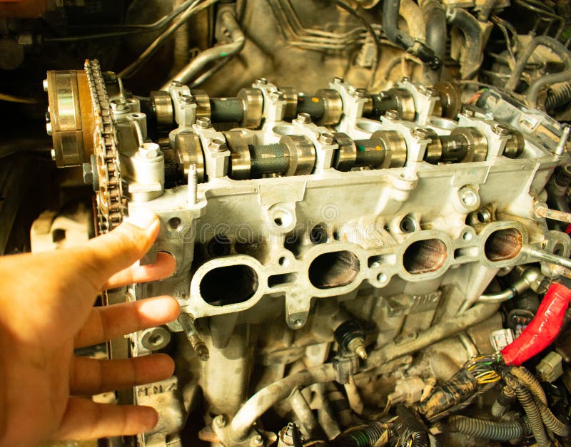 Mechanic Repairman Checking Open Engine in Automobile Center Stock ...