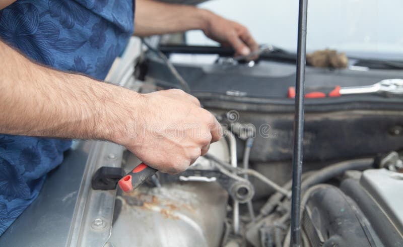 Mechanic Repairs Car Engine. Car Maintenance Stock Photo - Image of ...