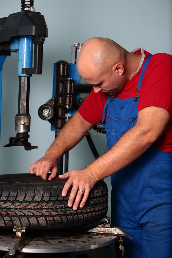 A Mechanic Working On A Car Stock Photo - Image of objects, open: 11730136