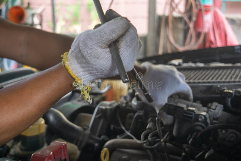 The Mechanic`s Hand is Fixing the Engine Stock Photo - Image of human ...