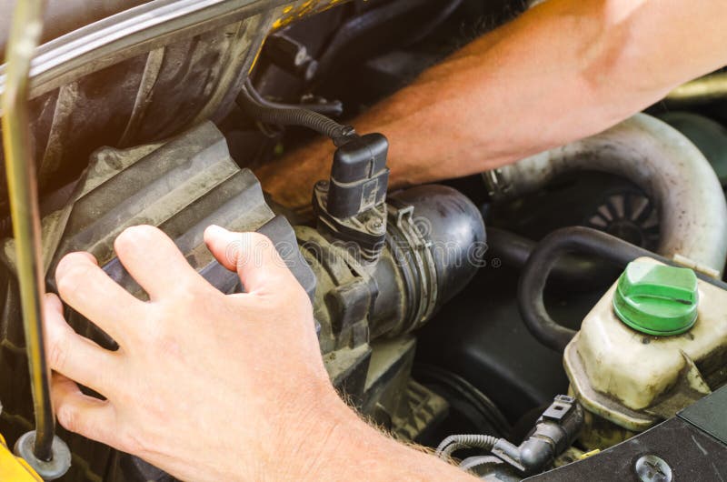 The Mechanic`s Hands Performing a Car Engine Check Stock Photo - Image ...