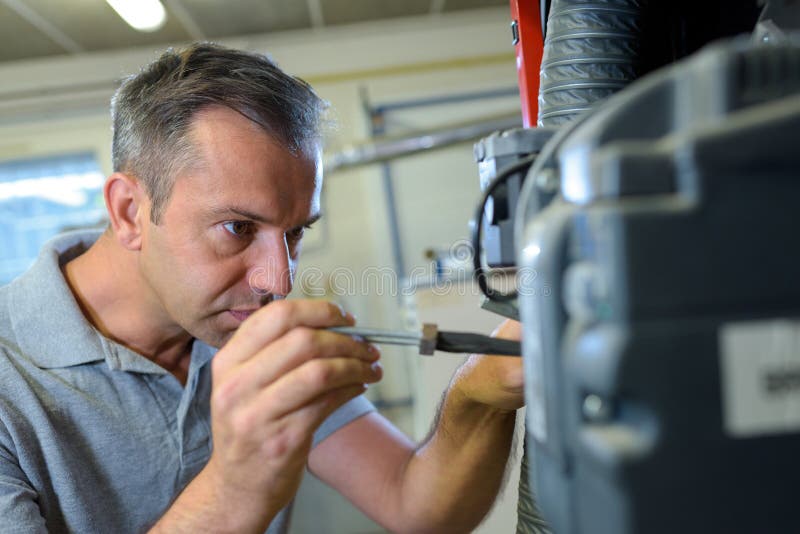 Mechanic with Scan Tool Diagnosing Car in Open Hood Stock Photo - Image ...