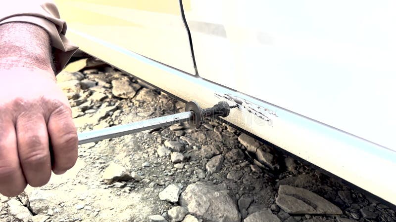 Mechanic Skillfully Using Dent Puller on the Damaged Part To Straighten ...