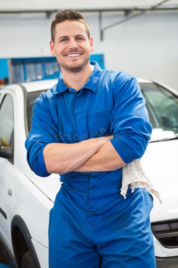 Mechanic Smiling at the Camera Stock Photo - Image of manual, male ...