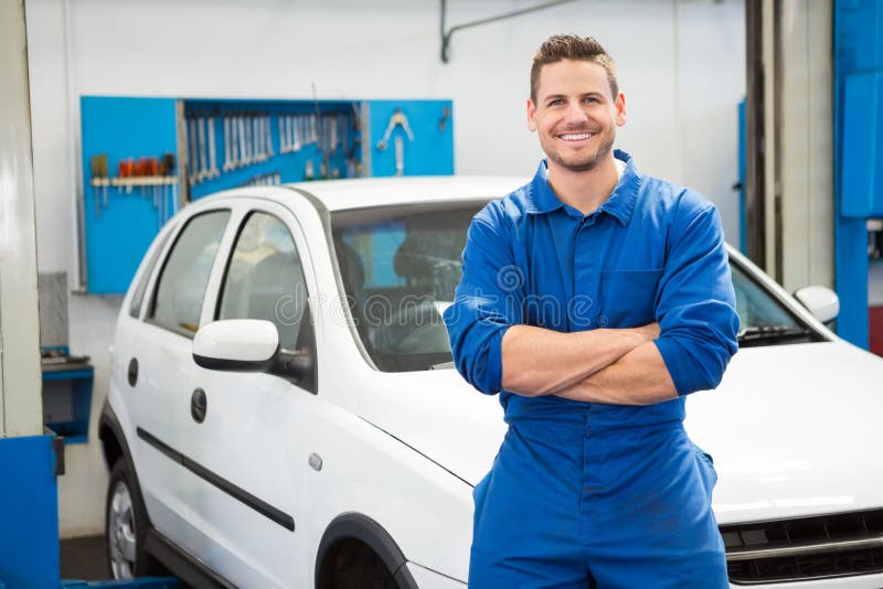 Mechanic Smiling at the Camera Stock Image - Image of work, crossed ...