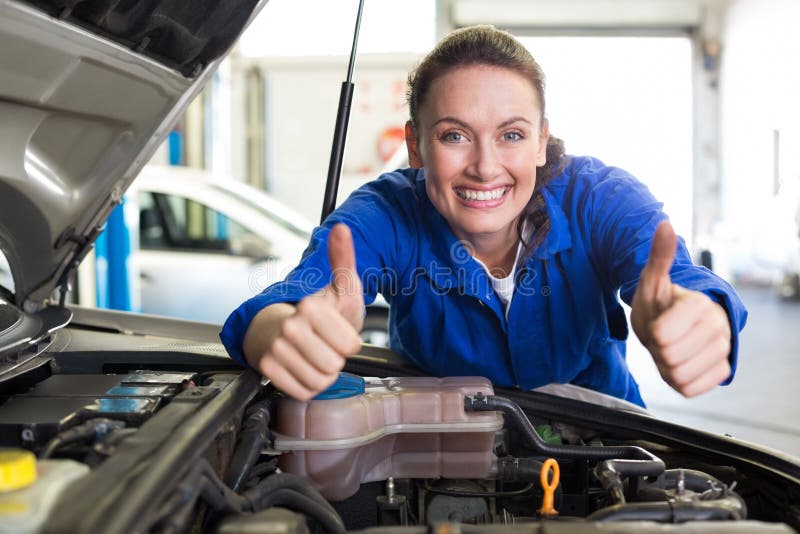 Mechanic Smiling at the Camera Stock Photo - Image of manual, male ...