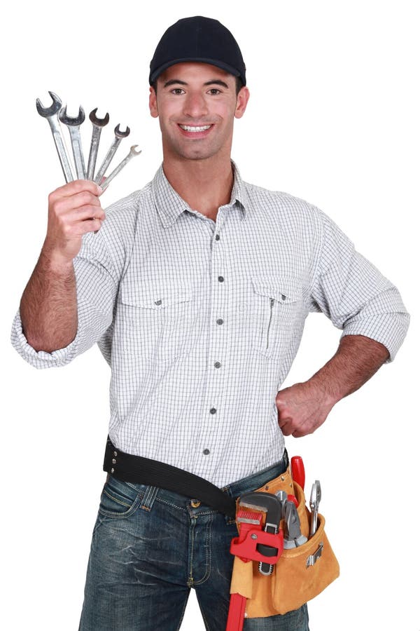Mechanic with spanners stock photo. Image of cheerful - 37037196