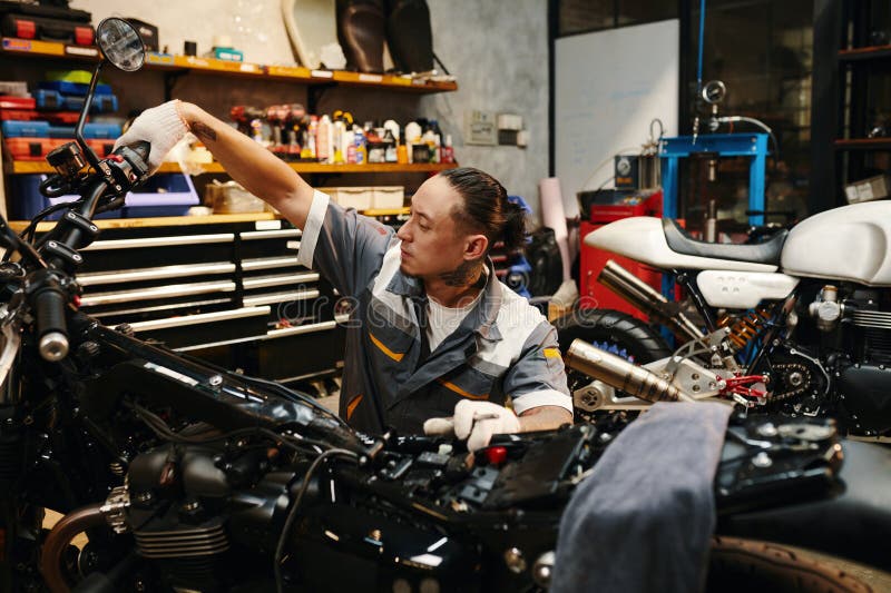 Mechanic Checking Motorcycle Engine Stock Image - Image of fixing ...