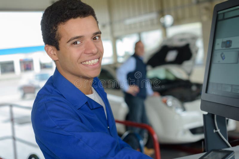 Mechanic Standing in Front Car with Pc Stock Photo - Image of ...
