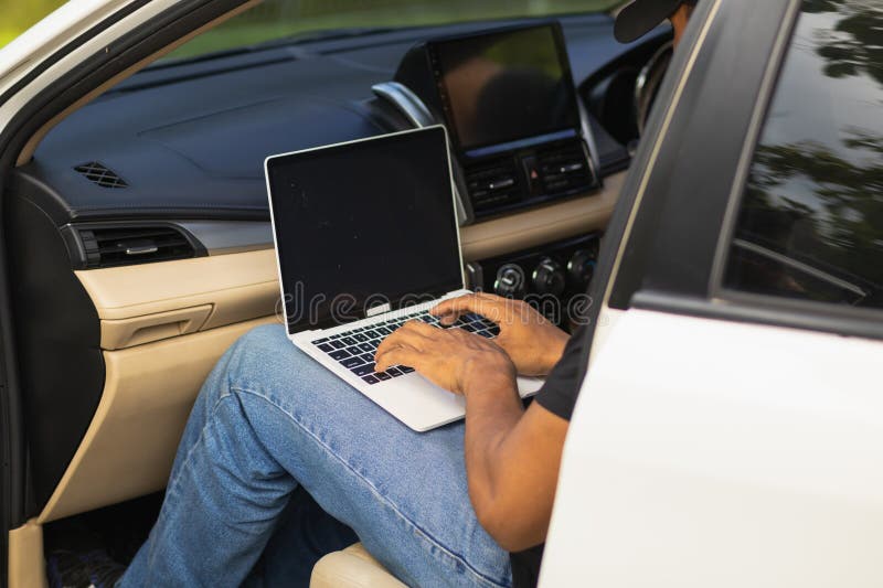 Mechanic is Using a Computer To Check the System of the Control Box ...