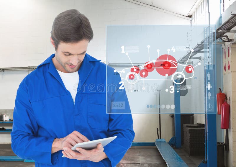 Mechanic Holding a Digital Tablet Against Digital Interface in Workshop ...