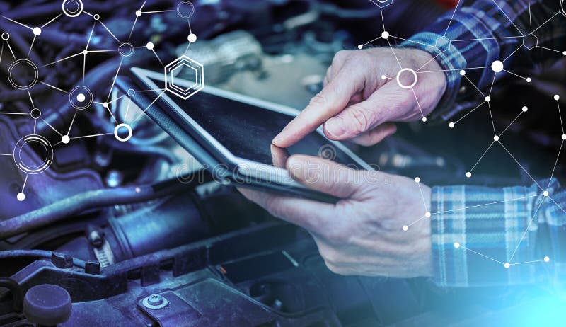 Mechanic Using Digital Tablet for Checking Car Engine; Light Effect ...