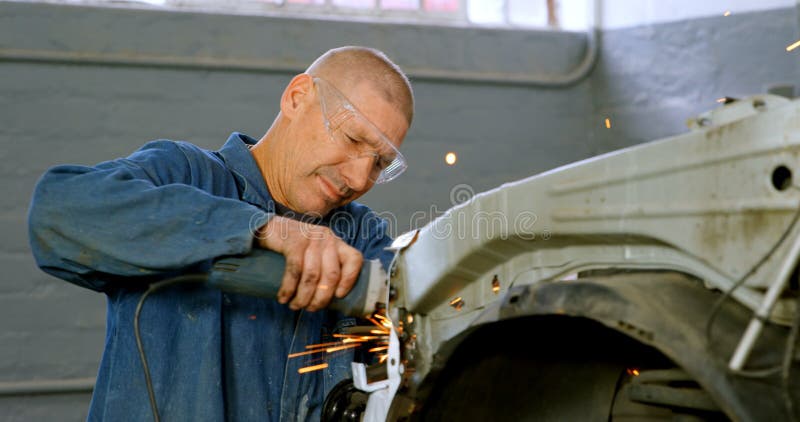 Mechanic Using Grinding Machine on a Car 4k Stock Video - Video of ...