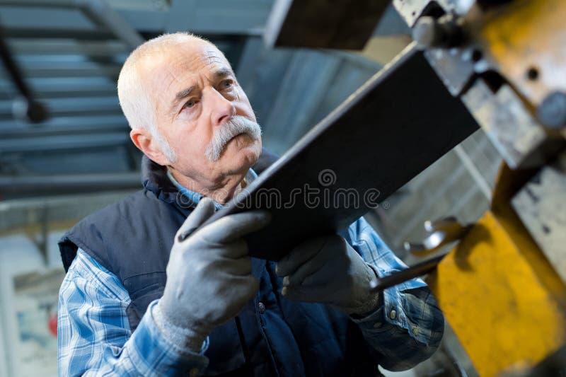 Mechanic Using Industrial Lathe Machine Stock Image - Image of ...