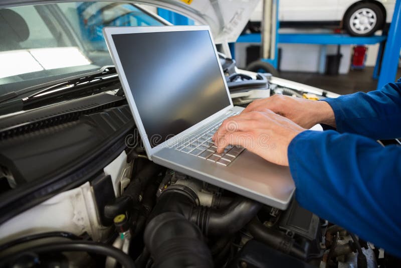 Mechanic Using Compute for Diagnostic Machine Tools Ready To Be Used ...