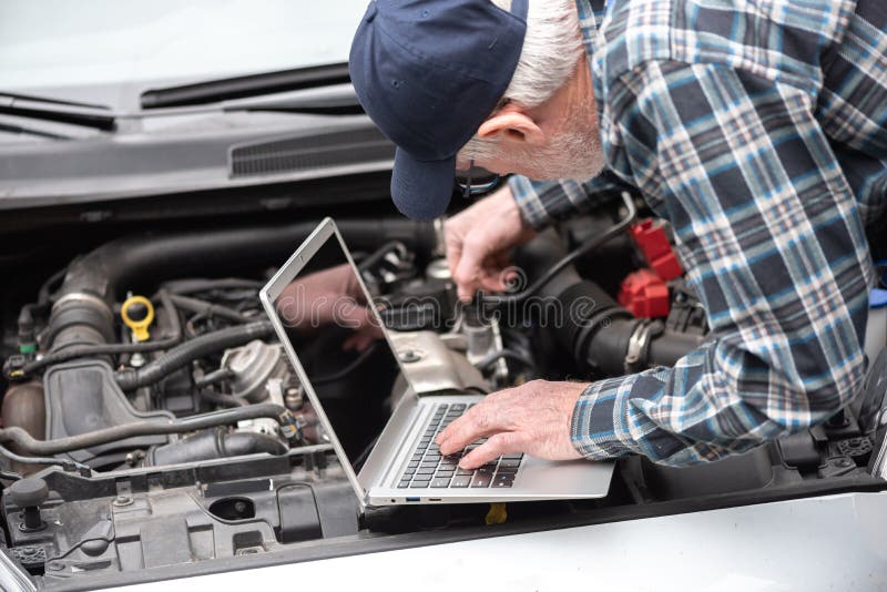 Mechanic Using Laptop for Checking Car Engine Stock Image - Image of ...