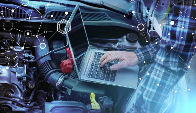 Mechanic Using Laptop for Checking Car Engine Light Effect Stock Photo ...