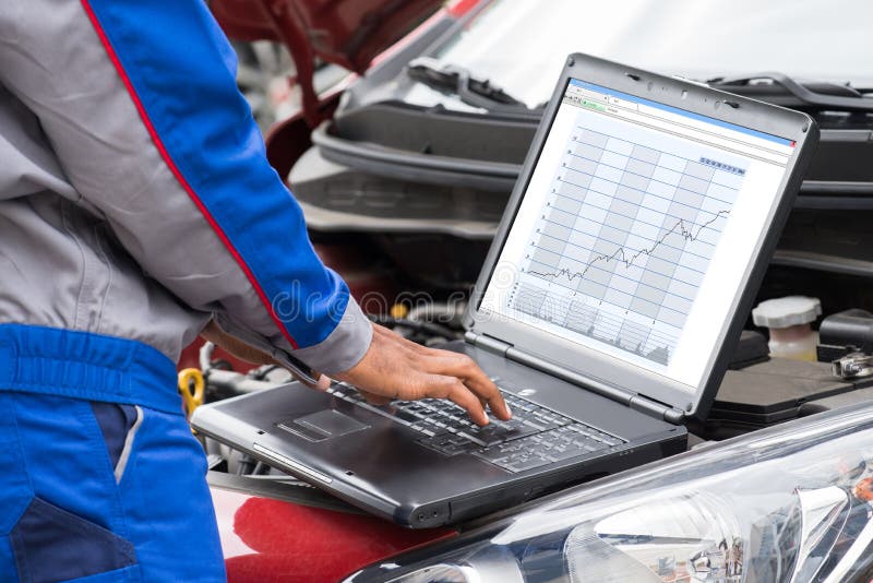 Mechanic Using Laptop for Examining Car Engine Stock Image - Image of ...