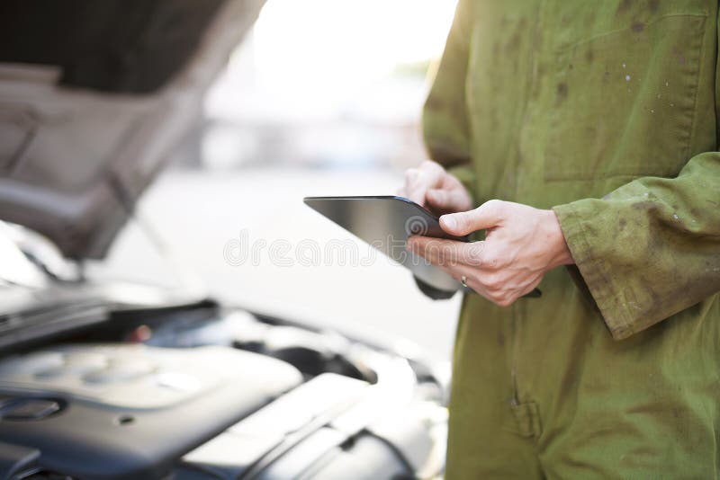 Mechanic at work stock image. Image of person, work, automobile - 10690503