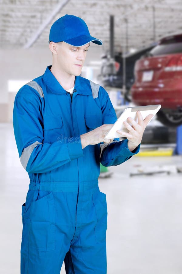Mechanic Using Compute for Diagnostic Machine Tools Ready To Be Used ...