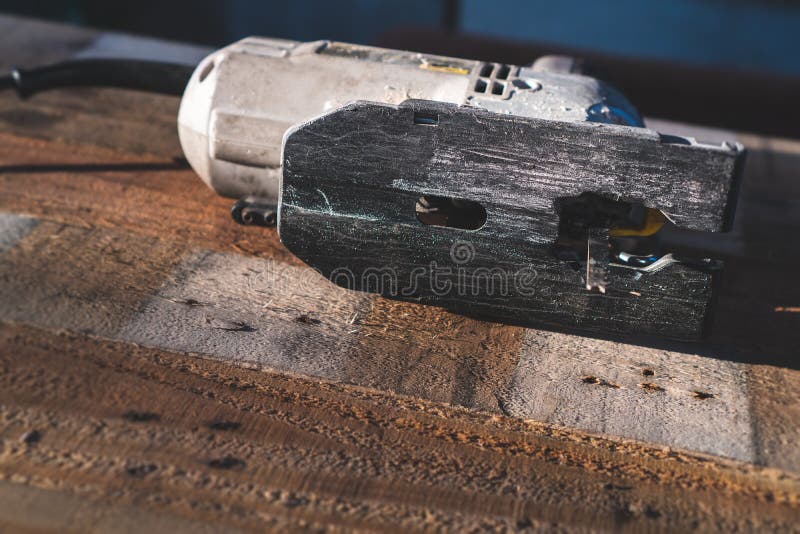 The Mechanic is Using Wood Cutting Tools in Construction Stock Photo ...