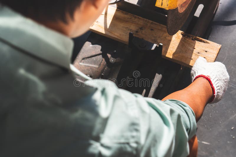 The Mechanic is Using Wood Cutting Tools in Construction Stock Image ...