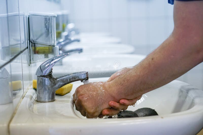 The Mechanic Washes His Dirty Hands after a Working Day Stock Image ...