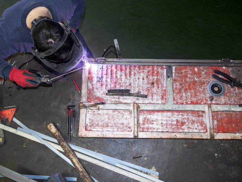 Mechanic Welding a Structure in His Workshop Stock Image - Image of ...