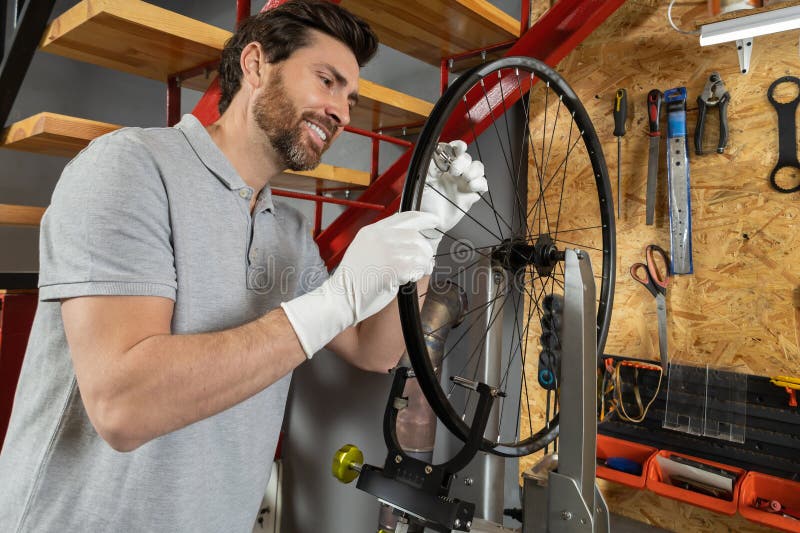 Mechanic in White Gloves Inspecting Wheel Stock Photo - Image of tools ...
