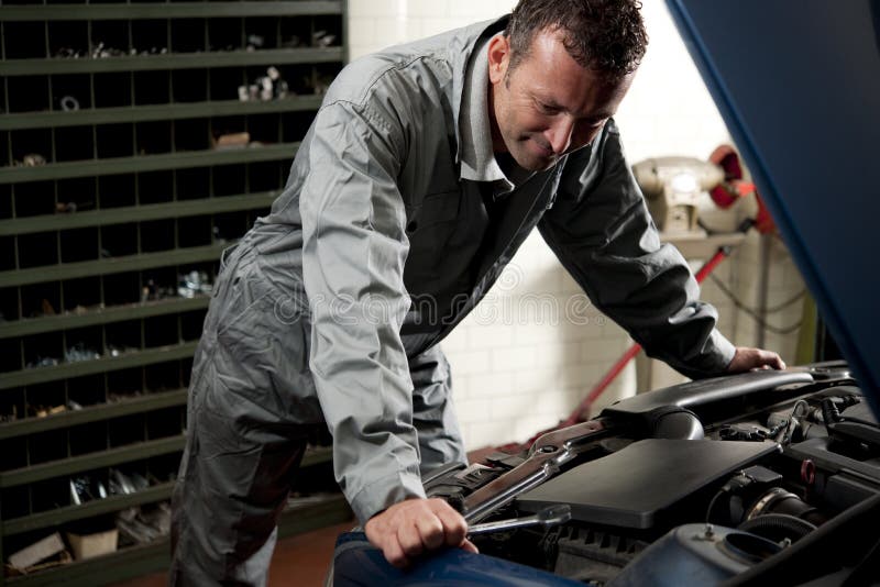 Mechanic at work stock photo. Image of male, caucasian - 17216820