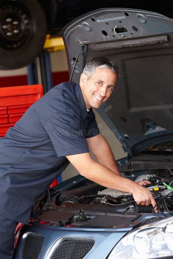Mechanic at work stock image. Image of person, hood, people - 21039481