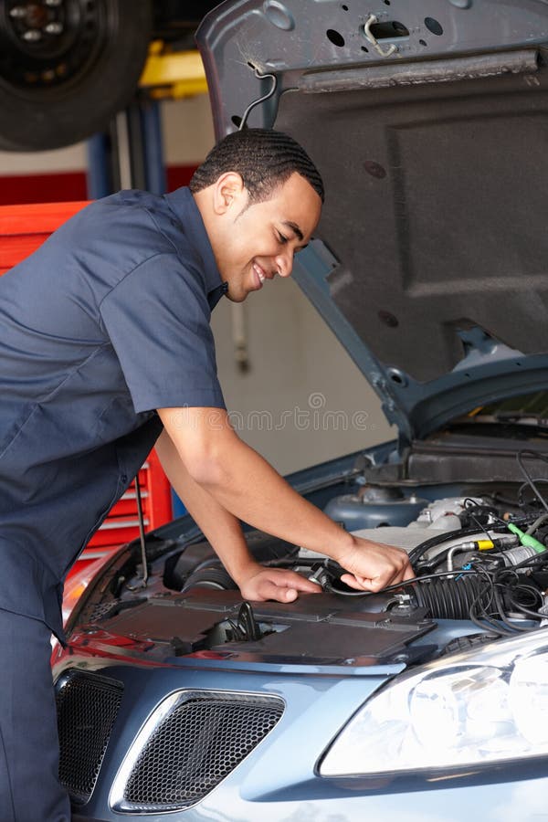 Mechanic at work stock image. Image of bonnet, garage - 21039437