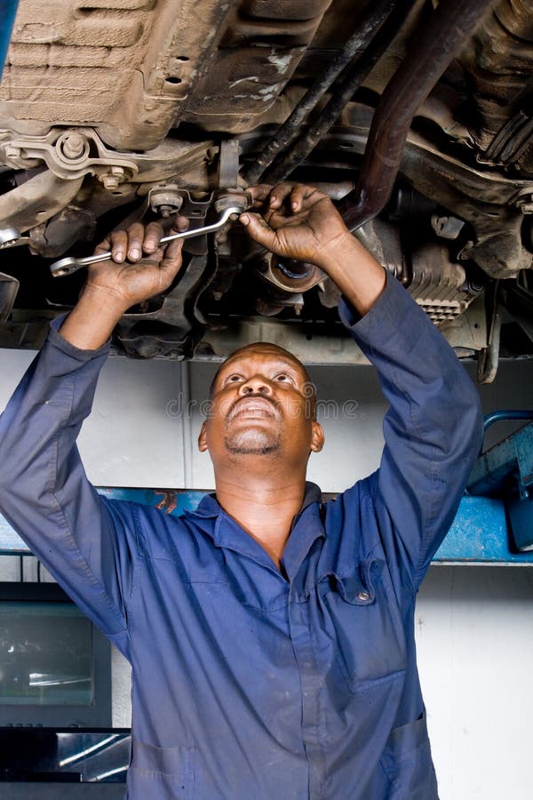 Mechanic at work stock image. Image of american, person - 7457681