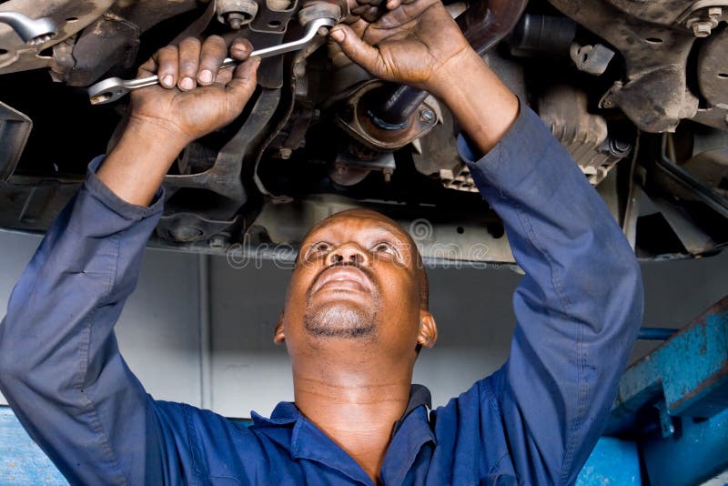 Mechanic at work stock image. Image of american, person - 7457681
