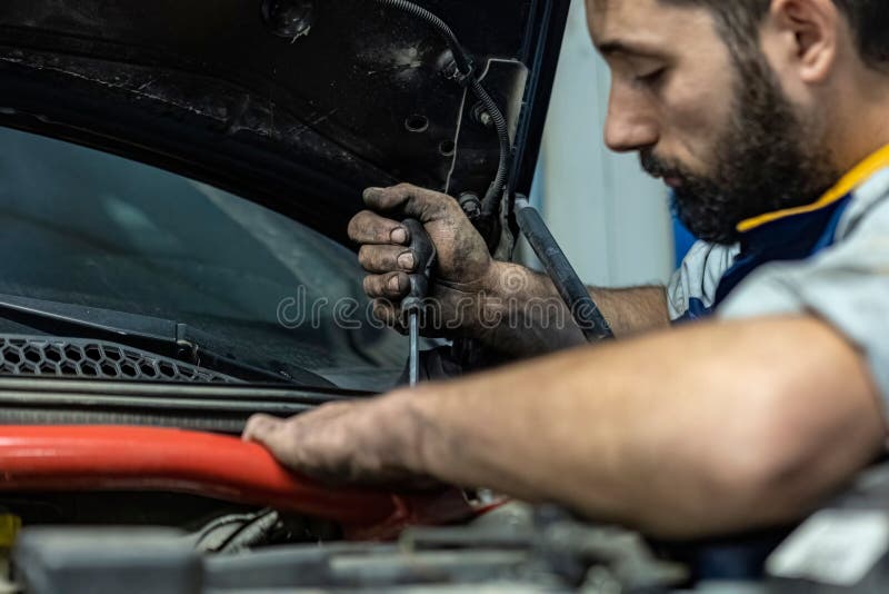 Mechanic at work . editorial photography. Image of engineer - 266113097