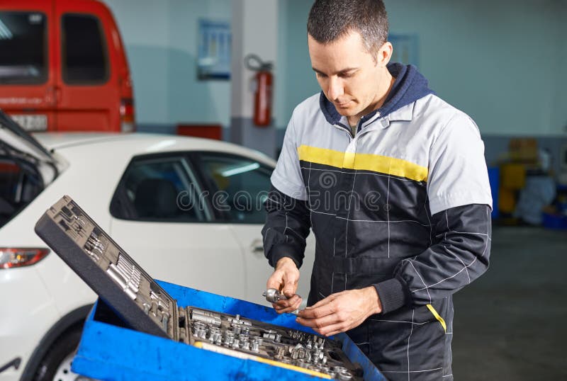 Mechanic at work shop stock photo. Image of working, mechanic - 49878868
