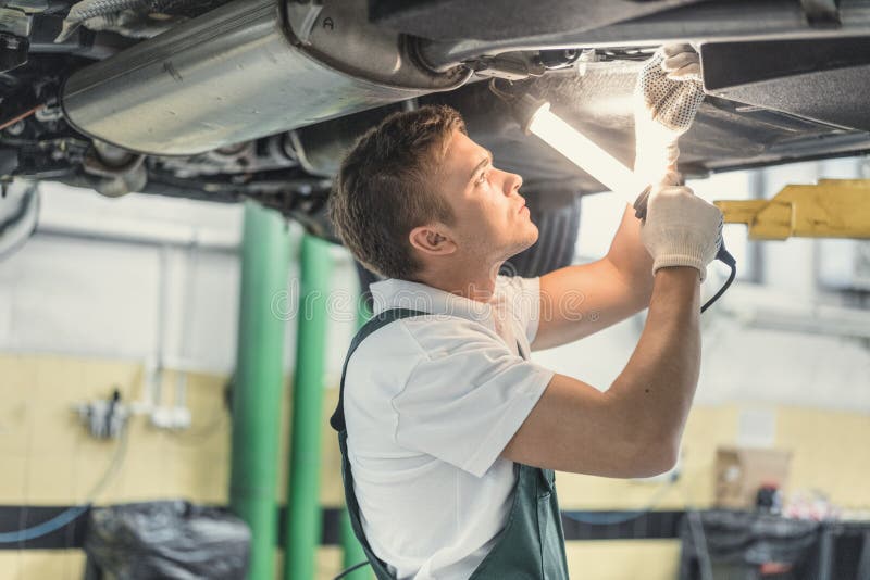 Mechanic at work stock photo. Image of overalls, worker - 88586908