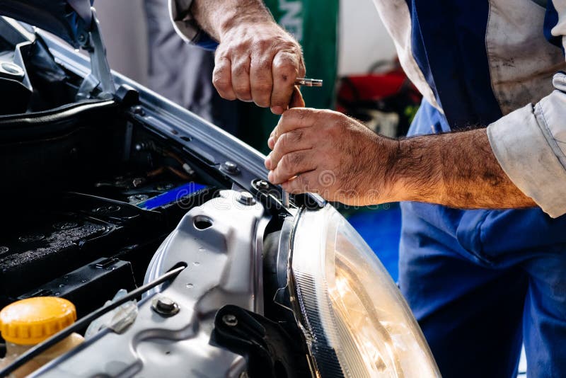 Mechanic at Work stock image. Image of engine, service - 65432551
