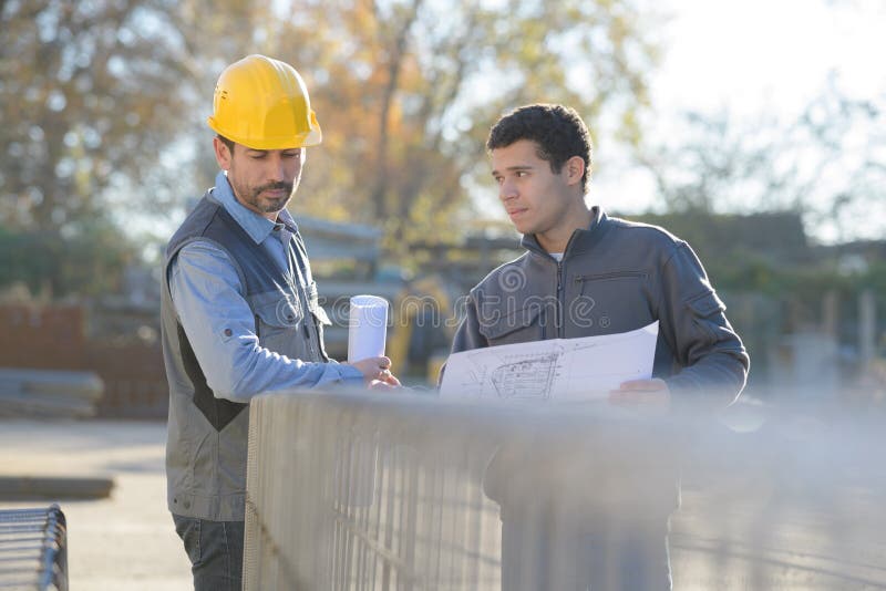 Mechanic Workers on Work Platform in Warehouse Stock Photo - Image of ...
