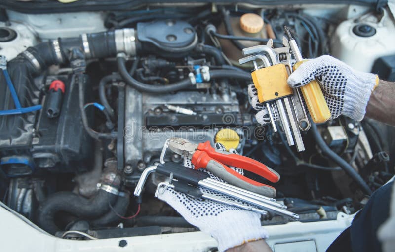 Mechanic Working in Auto Repair. Hands of Tools Stock Photo - Image of ...