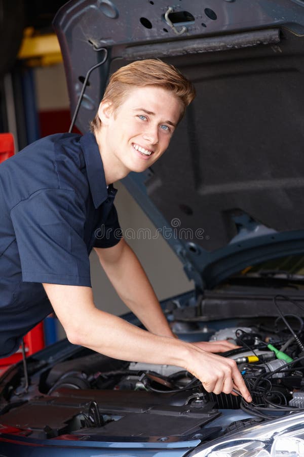 Mechanic working on car stock photo. Image of mechanic - 21039804