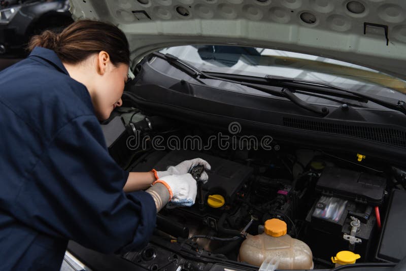 Mechanic Working with Car Engine in Stock Image - Image of maintenance ...