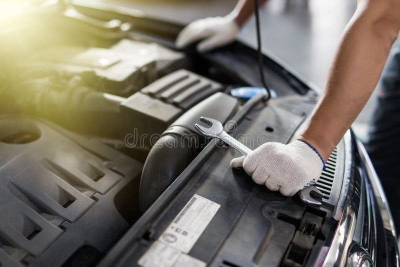 Young Man Mechanic Working on a Car Engine Stock Image - Image of ...