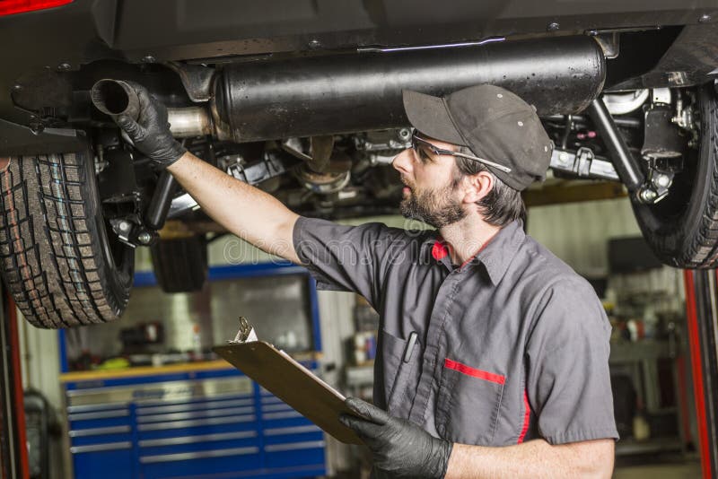 Mechanic Working on Car in His Shop Stock Image - Image of maintain ...