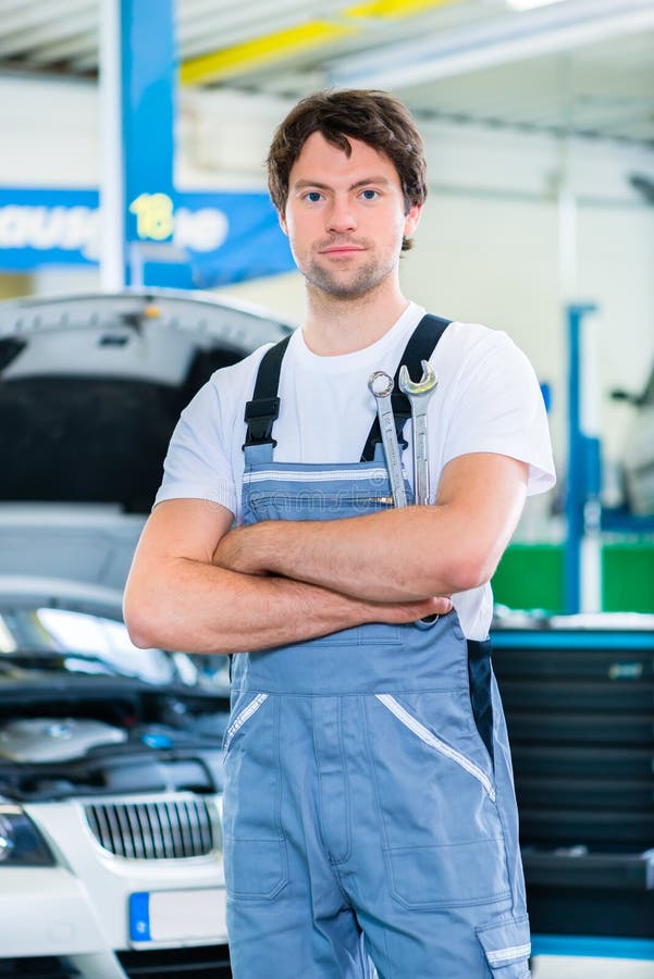 Mechanic Working in Car Workshop Stock Photo - Image of occupation ...