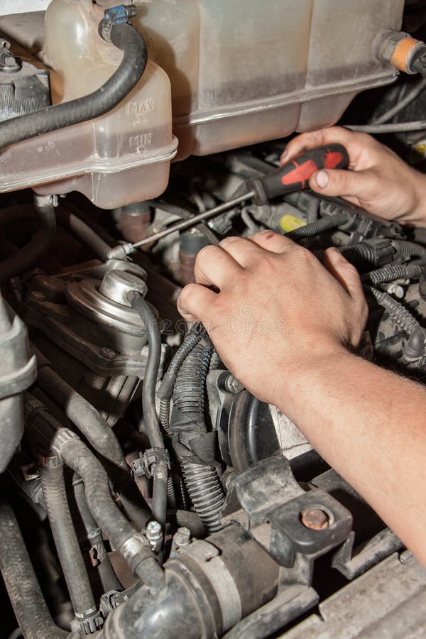 Mechanic working on engine stock image. Image of auto - 55483991
