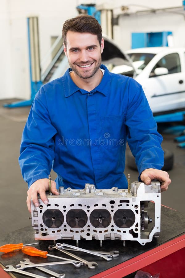 Mechanic Working on an Engine Stock Image - Image of maintenance, work ...