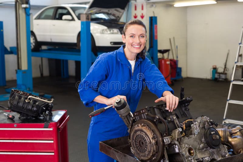 Mechanic Working on an Engine Stock Photo - Image of maintenance ...